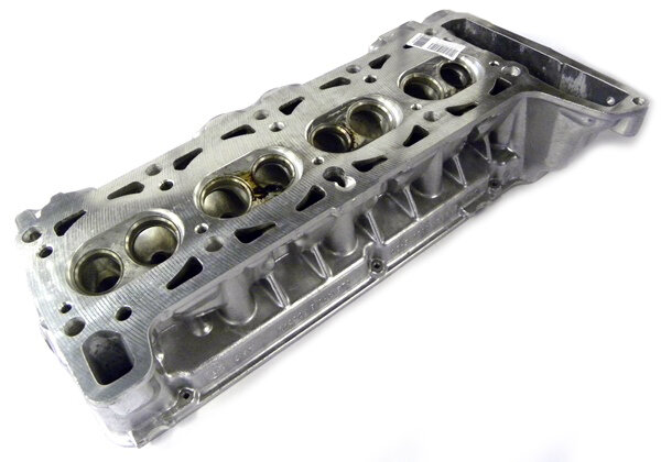 Головка блока ВАЗ 21214 голая инж. без шпилек (под большие г/компенсаторы) (АвтоВАЗ) н/о