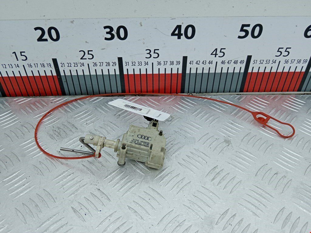 Сервопривод (электропривод моторчик привода) лючка бензобака Audi Q7 4L 4L0810773D арт. 1821232