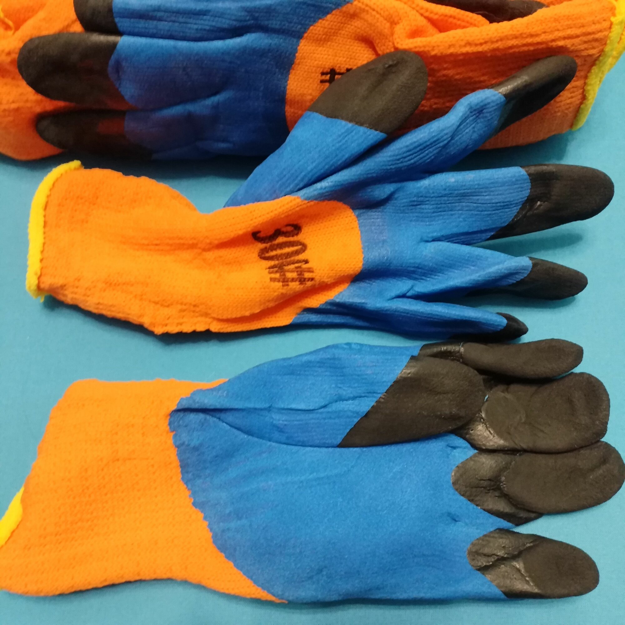 Перчатки вспененные утепленные обливные оранжево-синие