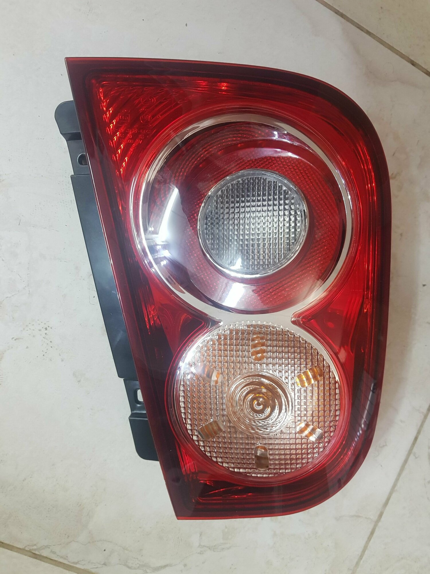 Фонарь задний левый Lifan Smily (320) [1.3 16V 5MT хетчбэк] F4133300B1
