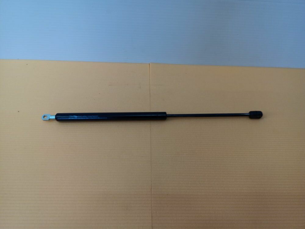 Амортизатор вещевого ящика бардачка МАН ТГА ТГС ТГХ (NAN TGA TGS TGX)