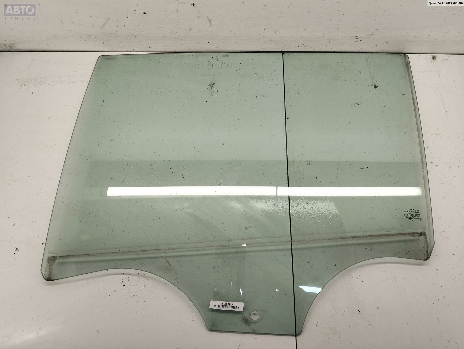 Стекло двери задней левой Skoda Rapid