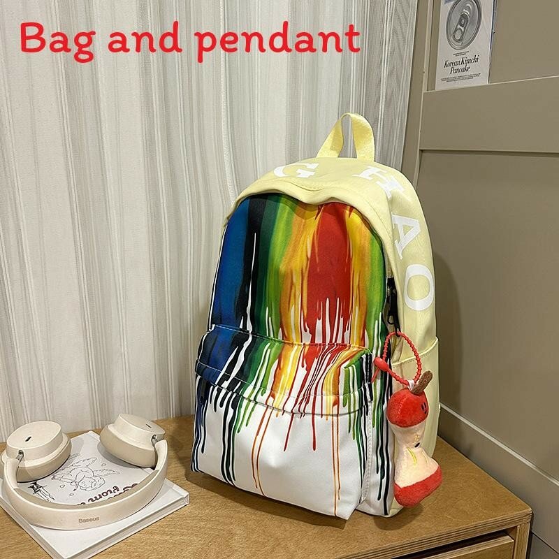 Creative colored graffiti student backpack with plush pendant for 14in laptop yellow