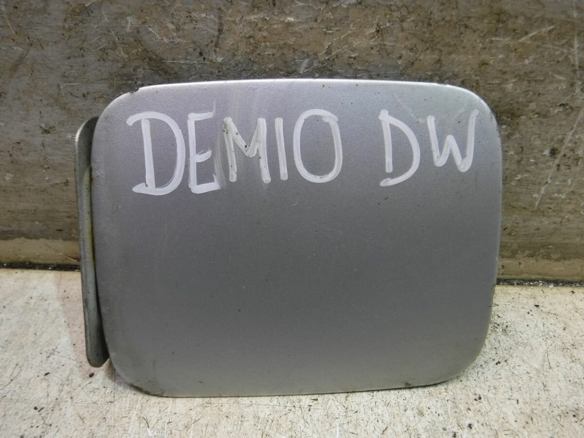 Лючок бензобака Mazda Demio DW (1996—2003)