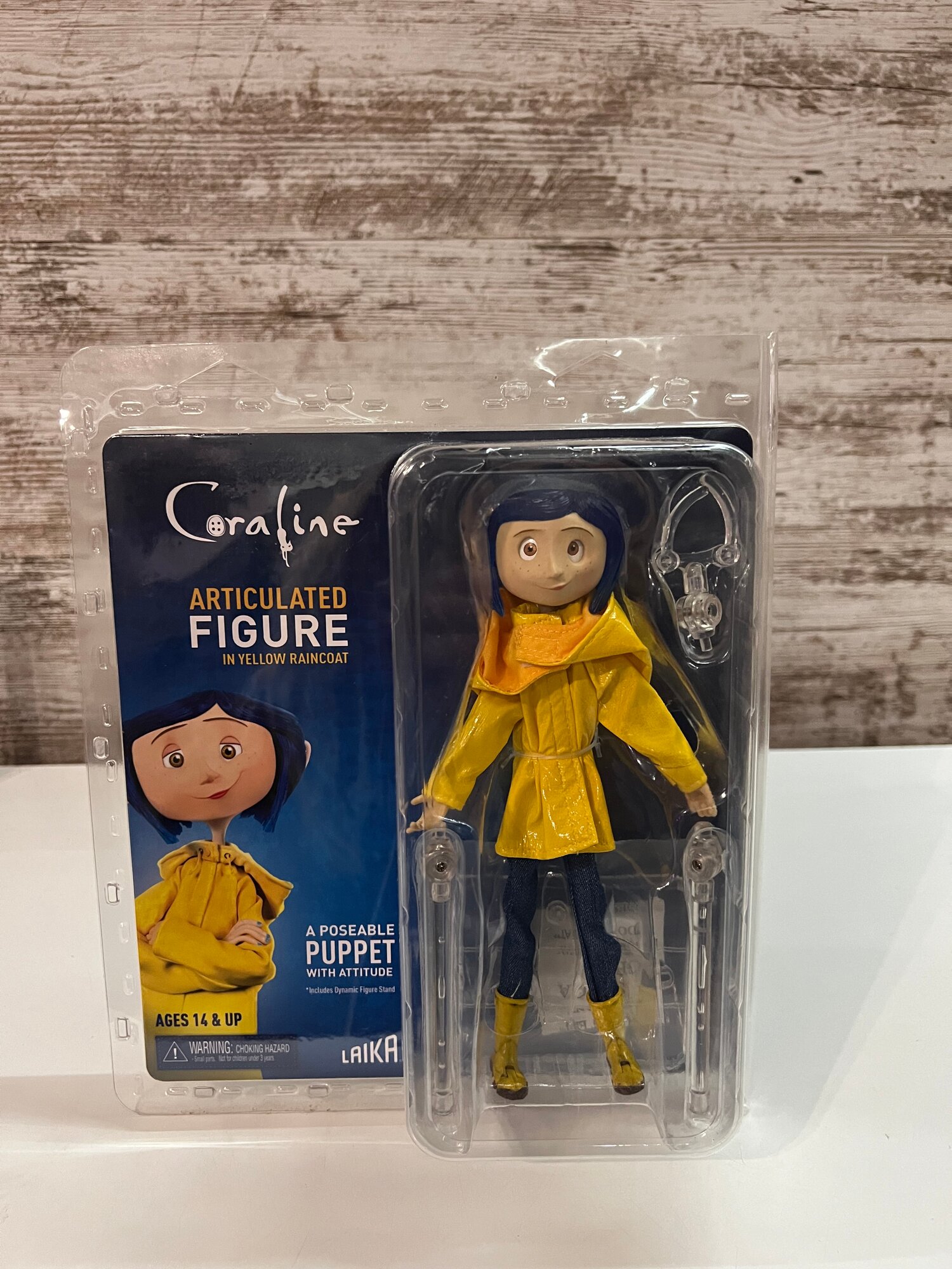 Фигурка Коралина Coraline Articulated Figure in Yellow Raincoat 18 см от Neca