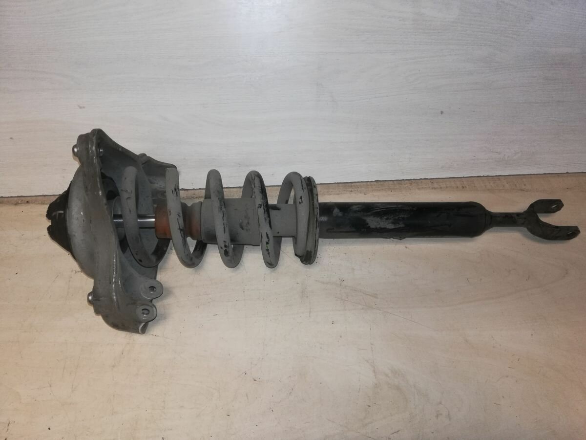 Амортизатор передний пружина в боре Audi A6 C6 4F