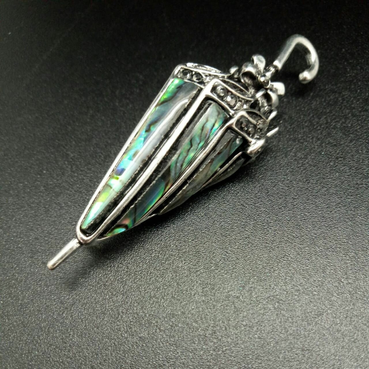 Брошь, гелиотис