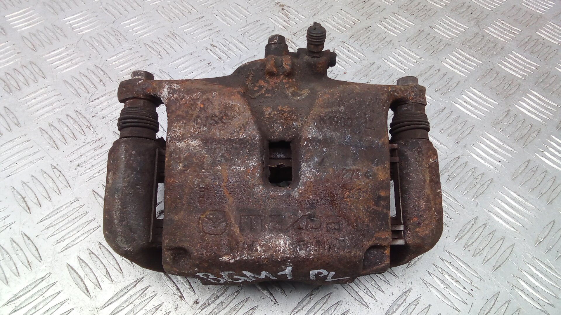 Суппорт тормозной передний левый MAZDA 3 BM