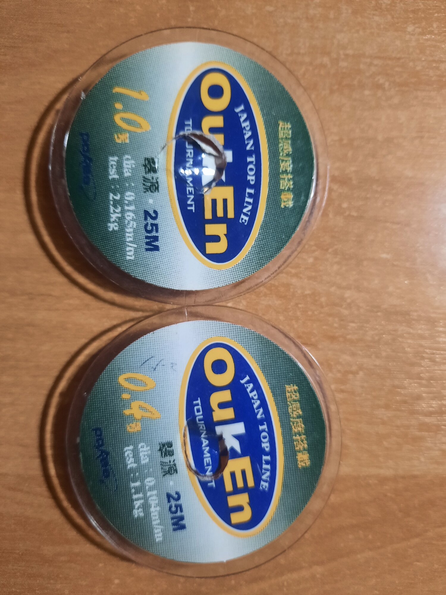 Леска зимняя OUKEN набор 2 шт, 25 м, (0.104 мм/1.1 кг и 0.165 мм/2.2 кг), красная