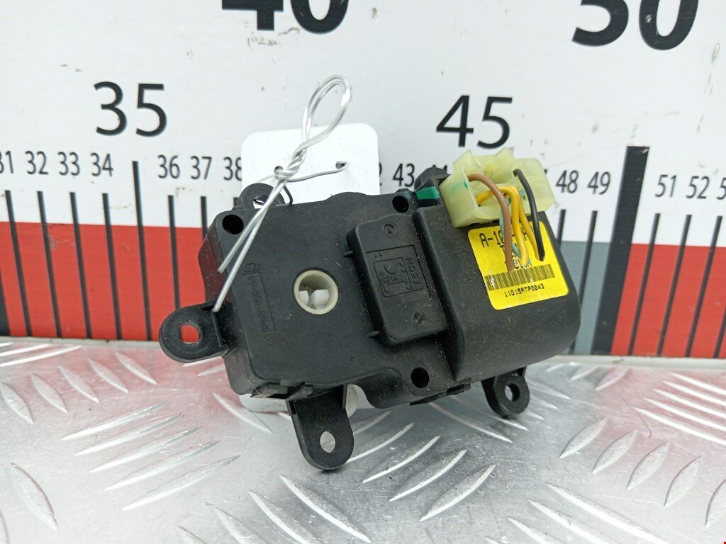 Сервопривод (электропривод моторчик привода) заслонки печки SsangYong Rodius (Stavic) 1 арт. 1843439