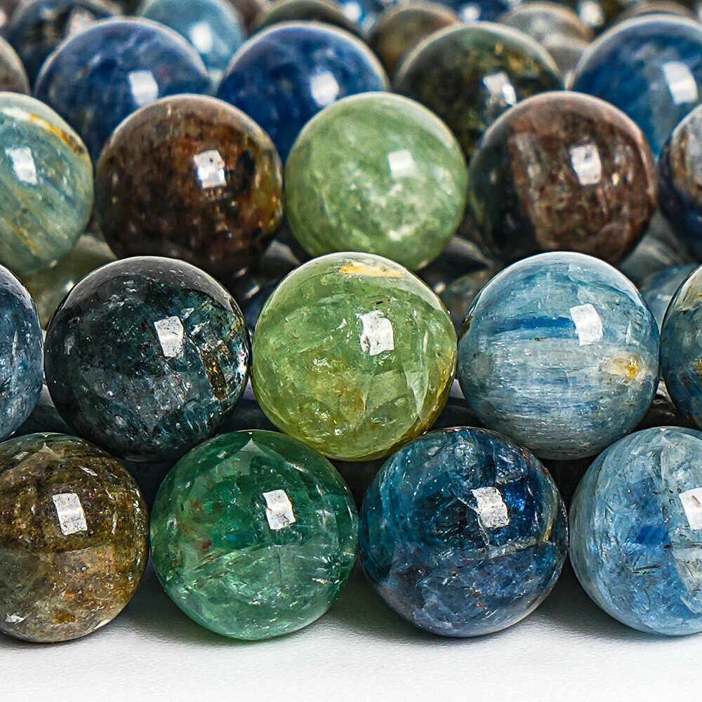 Кианитовые бусины темно-зеленый синий 10-11 мм, 37beads