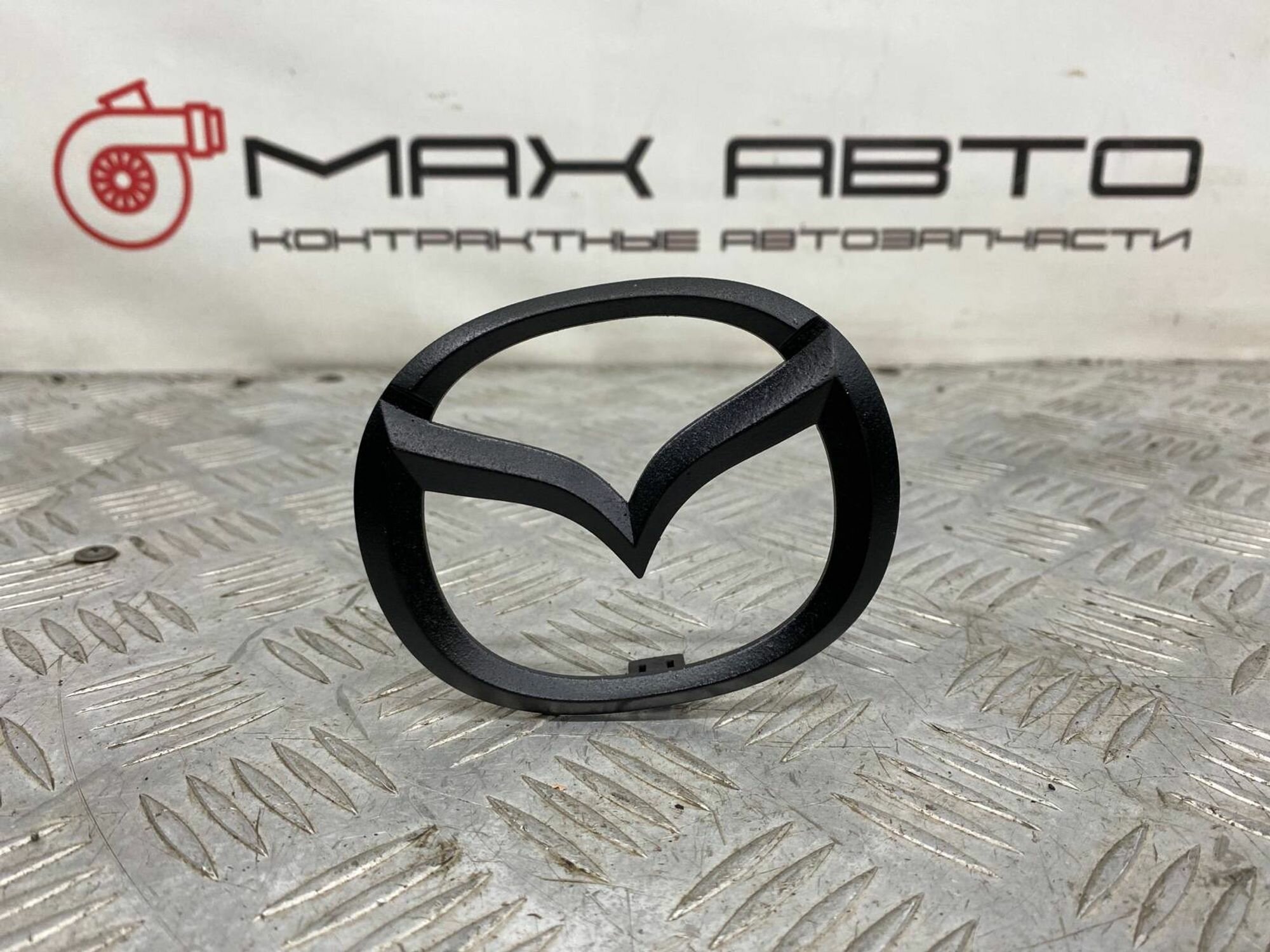 Б/У эмблема ( шильдик, значок ) Mazda Demio DY3W