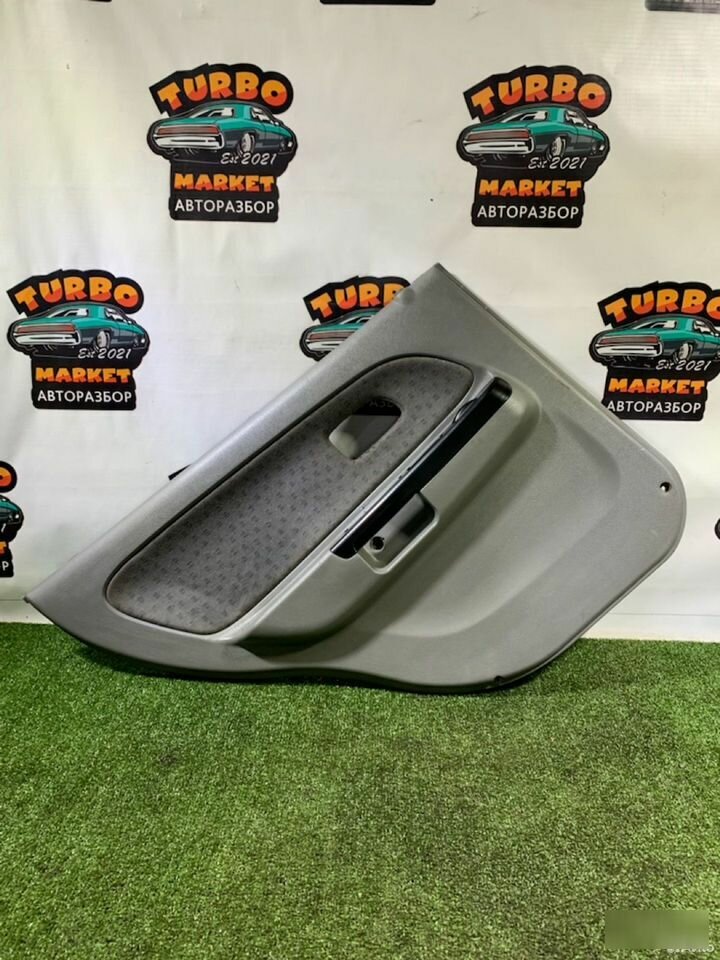 Обшивка двери задняя левая Kia Rio 2002-2005