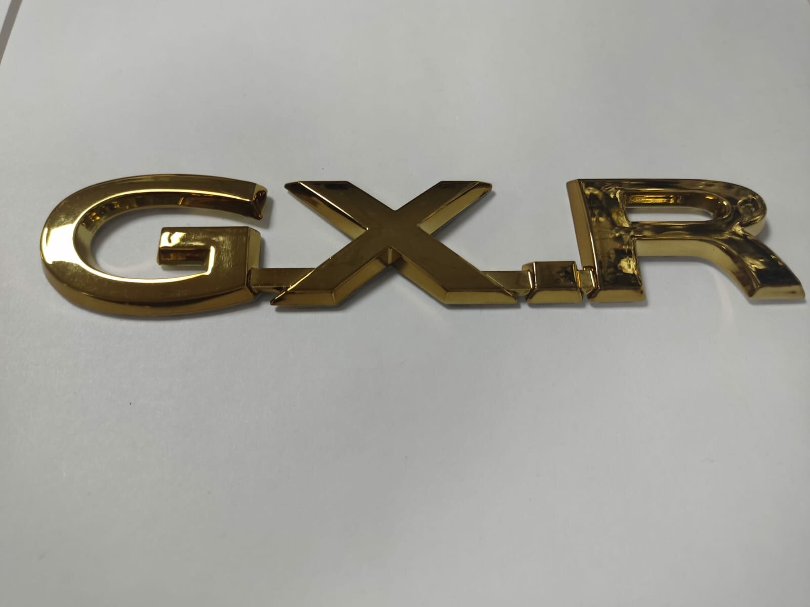 Шильдик эмблема GXR, для Toyota, пластик/углепластик, самоклеящийся, 15.5х3 см