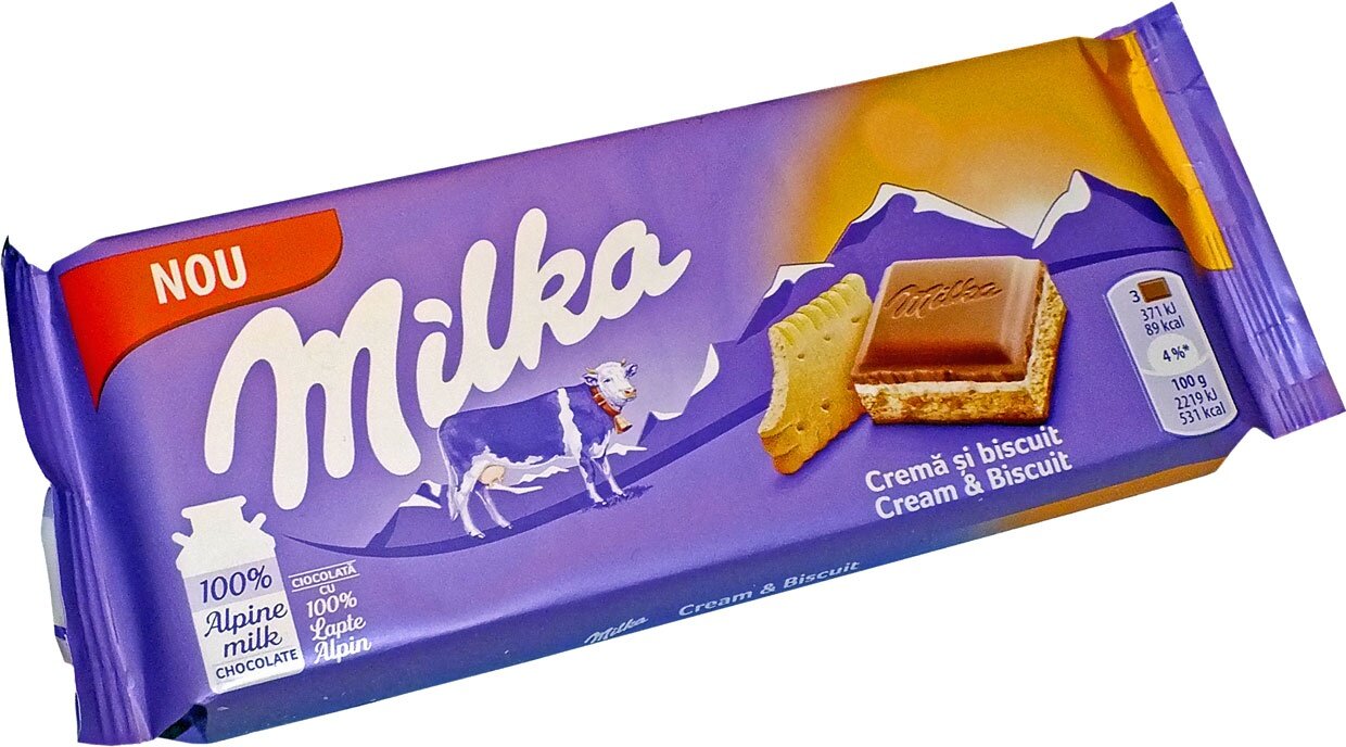 Шоколад MILKA молочный с кусочками печенья Creme Biscuit 100г