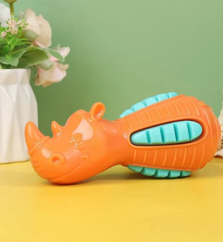Игрушка Носорог для животных с пищалкой 16х7х7 см оранжевая
