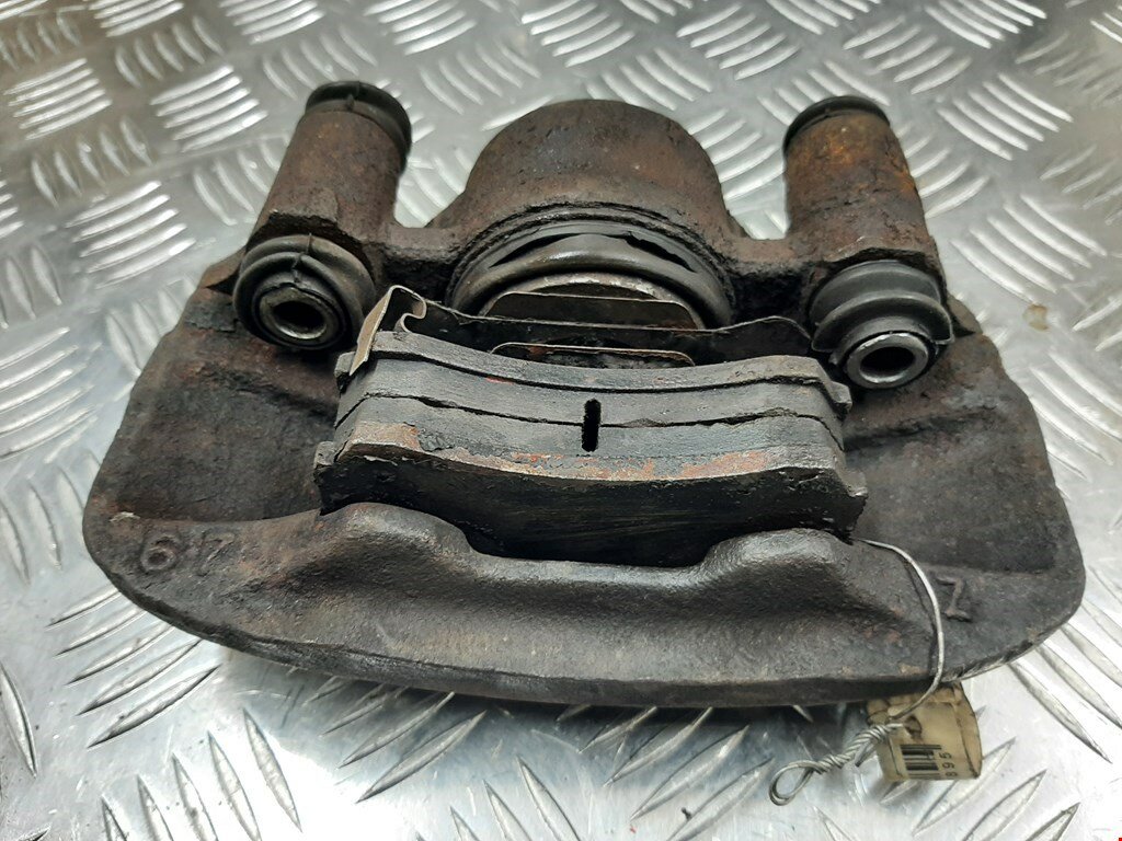 Суппорт передний правый Mazda 323 BJ BR743398ZB арт. 461789