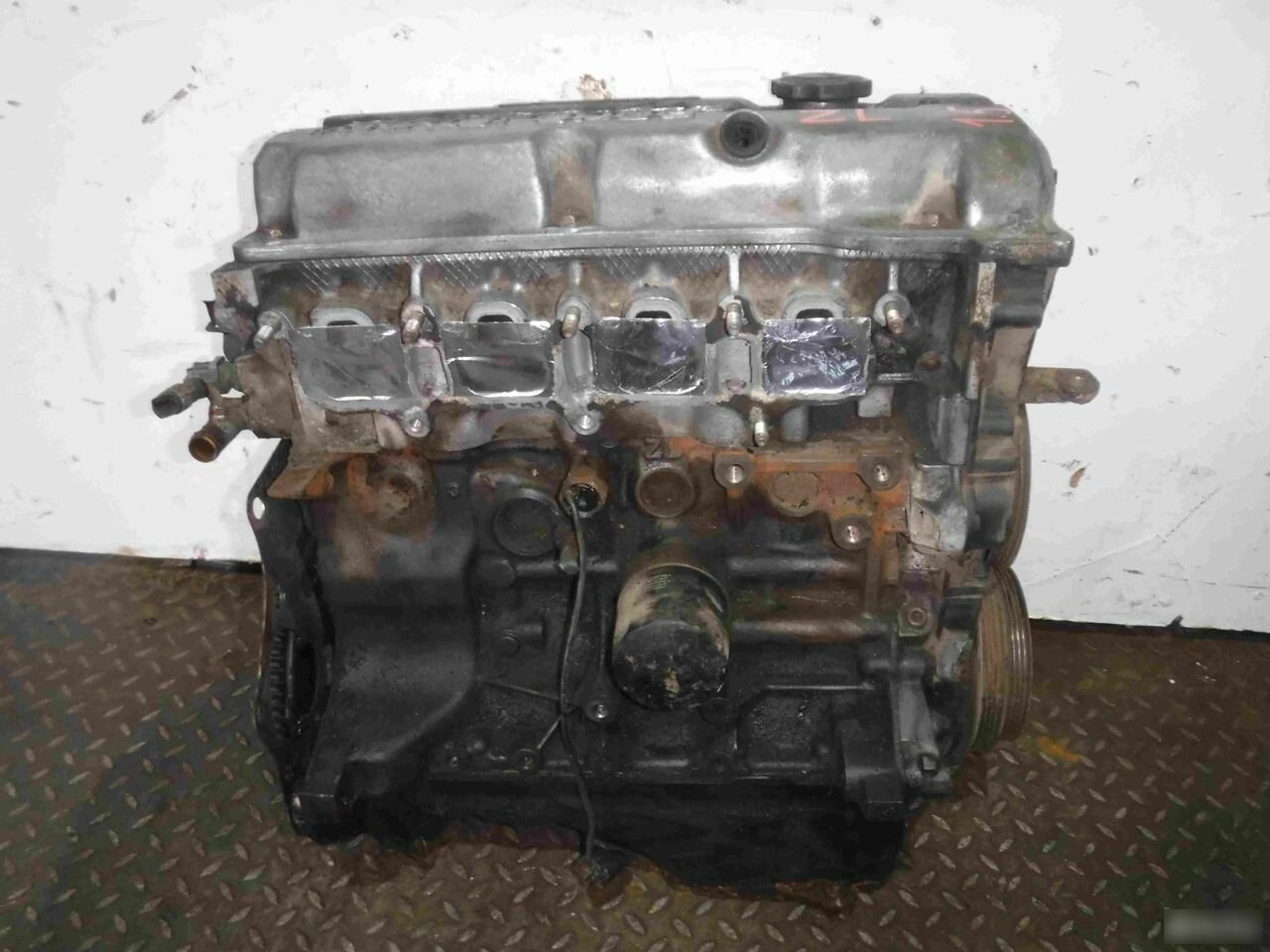 Двигатель Mazda Familia BJ (1998—2004) ZL0102300D