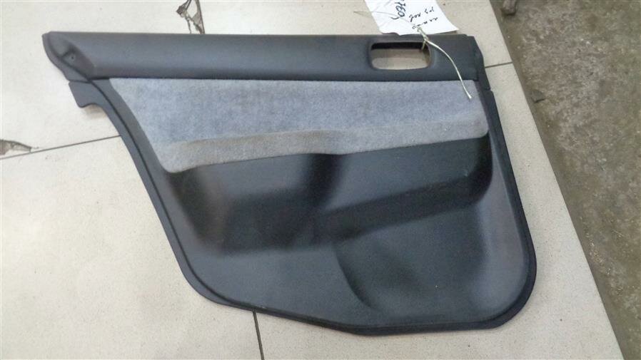 Обшивка двери задней левой от Mitsubishi Lancer 9 CS 2000-2008