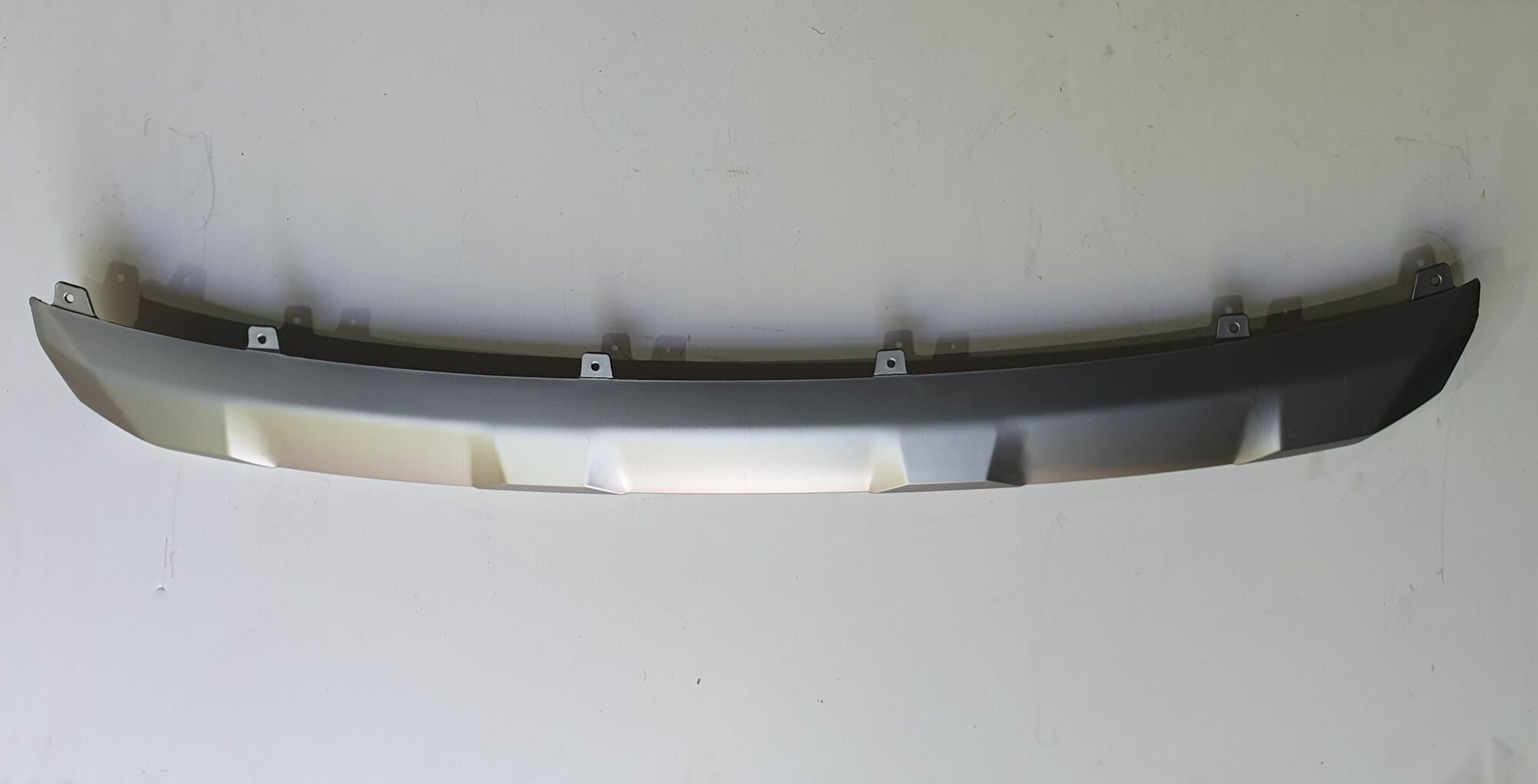 Молдинг бампера переднего нижний Geely Monjaro [2.0 16V 8AT внедорожник 4X4 Turbo] 6010177700