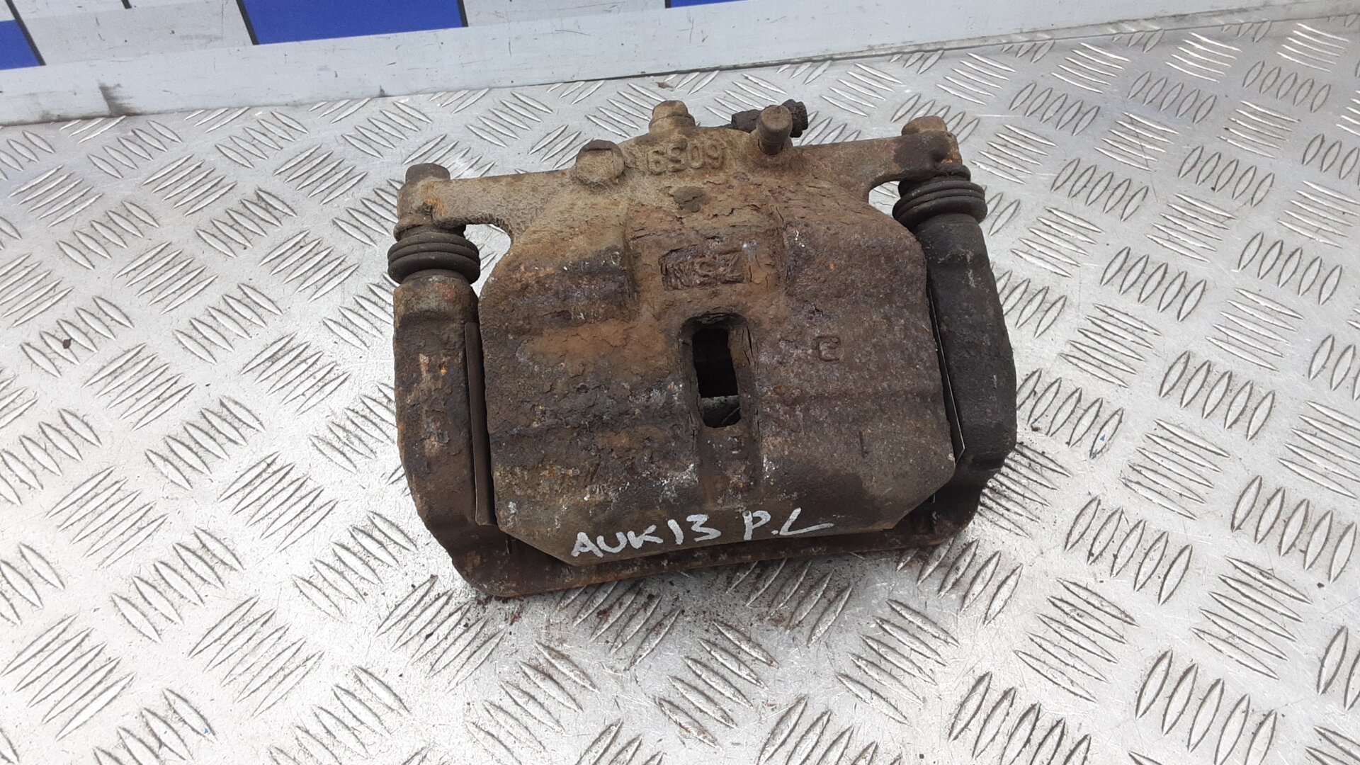 Суппорт тормозной передний левый NISSAN X-TRAIL T31, Номер 410114BA0C, 410114BA0A, 41011JD00A