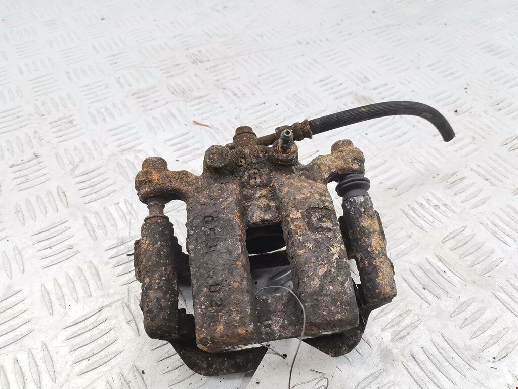 Суппорт задний правый Nissan Qashqai+2 44001JY00A арт. 1706665