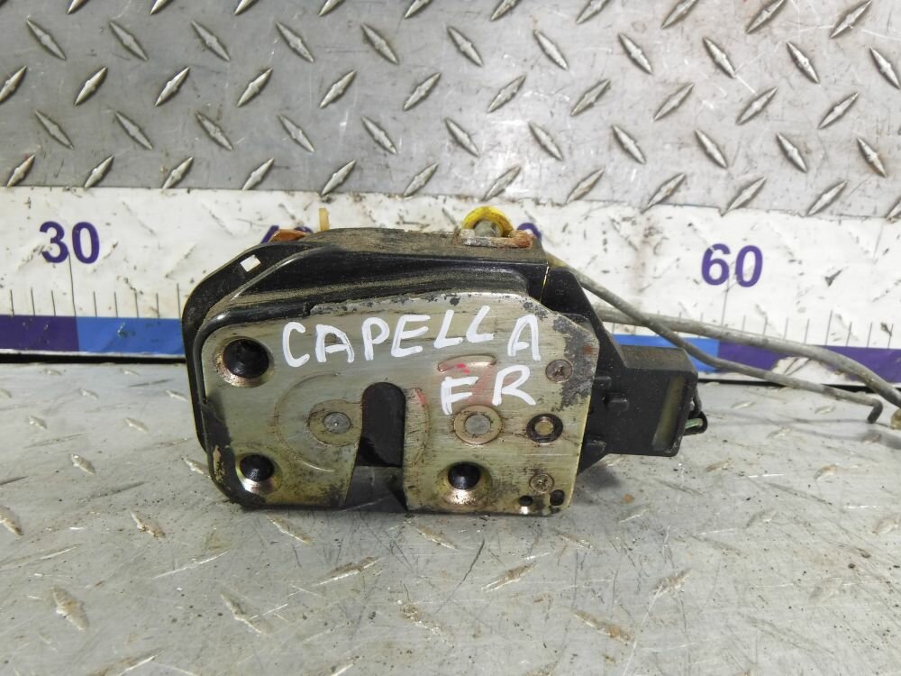 Замок двери передней правой Mazda Capella G06T58310C
