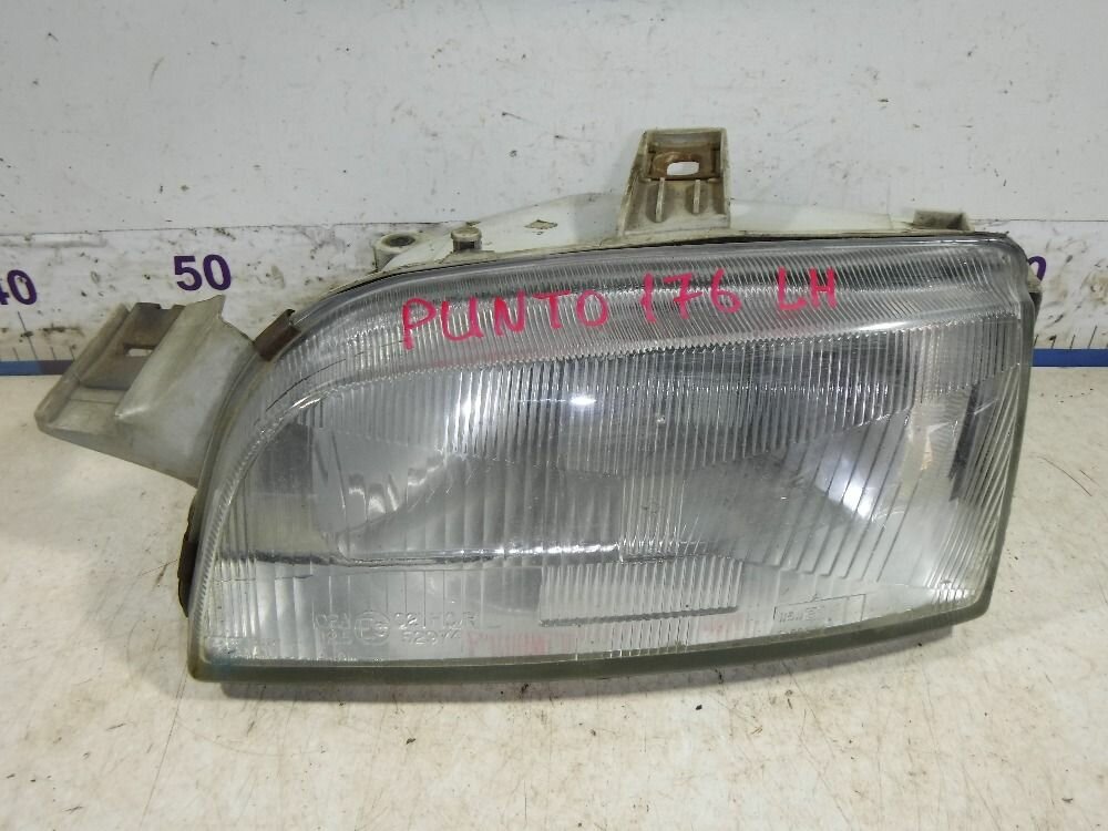 Фара левая Fiat Punto I 46407146