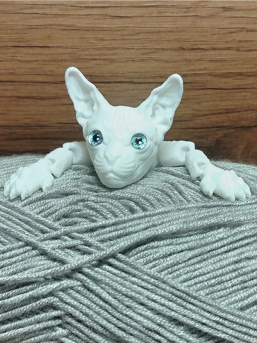 Игрушка антистресс кот сфинкс 3D подвижный белый