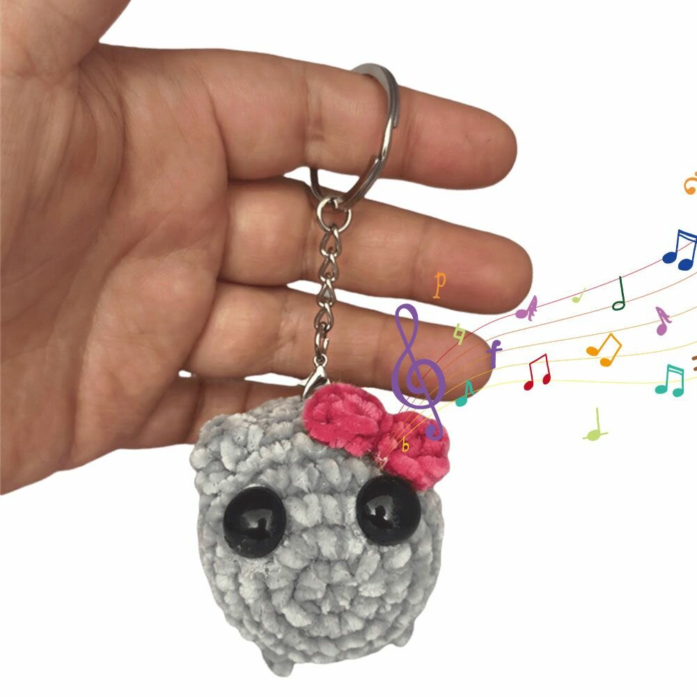 Грустный хомяк с музыкой и бантом плюшевый брелок