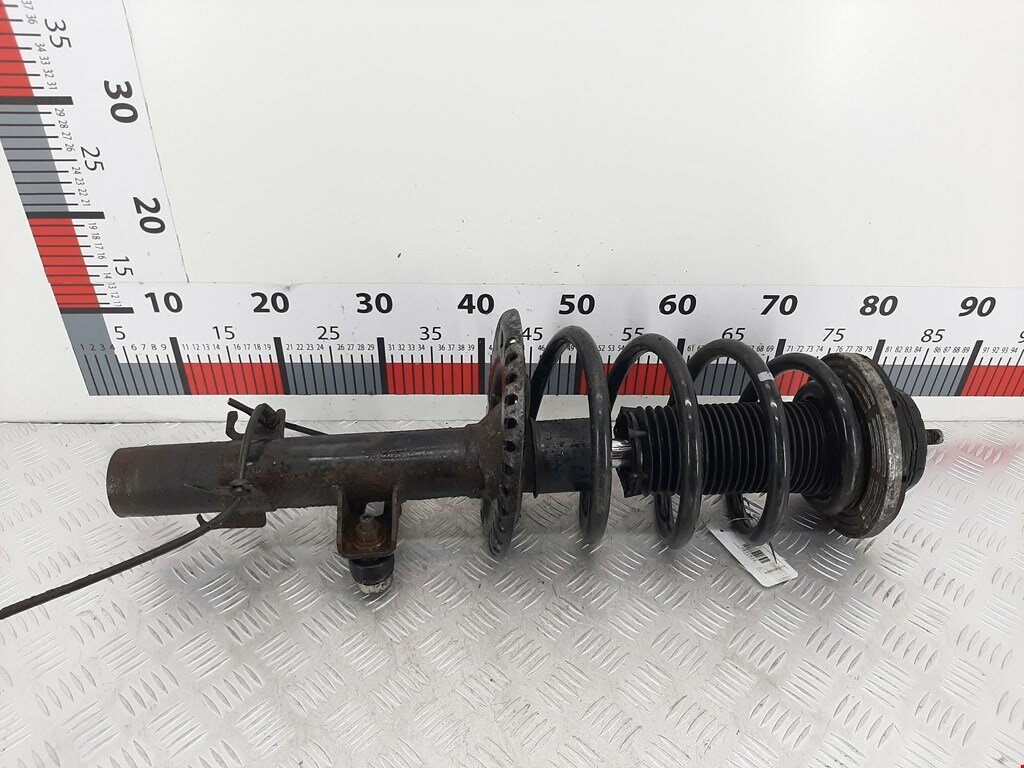 Стойка амортизатора переднего левого Volkswagen Transporter (T5) 7E5413031H арт. 1811932