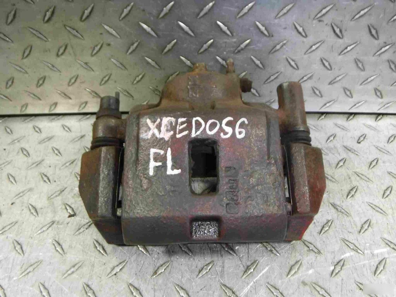 Суппорт тормозной передний левый Mazda Xedos 6 I (1992—2000) GC5D33990