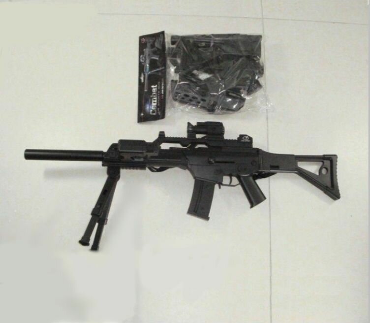 Автомат пневматический разборный стреляет 6 мм пульками.