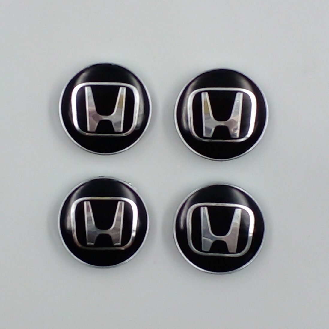 Колпачки заглушки на литые диски с эмблемой 60 мм 4 шт