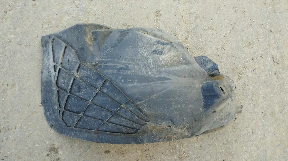 Подкрылок передний левый перед Opel Corsa D 13187356