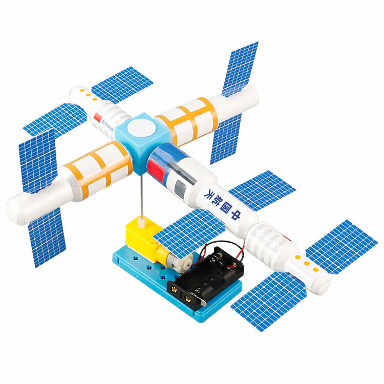 Научно-технический набор для творчества: модель космической станции, искусственный спутник, материалы для детского творчества, научный эксперимент.