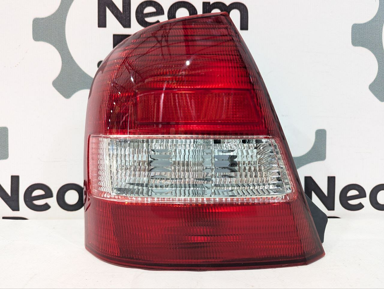 Фонарь задний левый Mazda 323 BJ 2001-2003