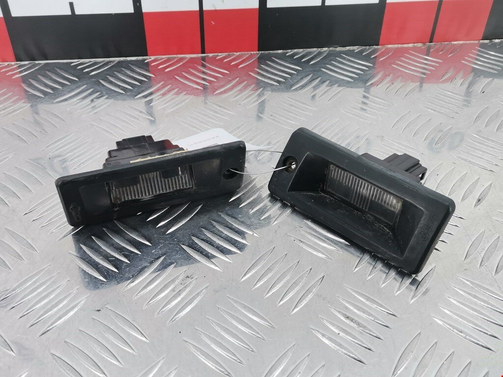 Подсветка номера Volkswagen Caddy 2 6K9943021 арт. 1574889