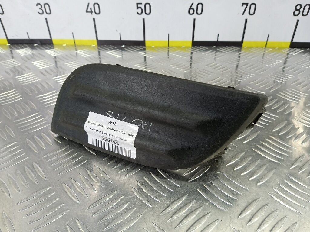 Накладка бампера переднего Б/У для SUZUKI LIANA I рестайлинг (2004—2008) 7171654GA15PK