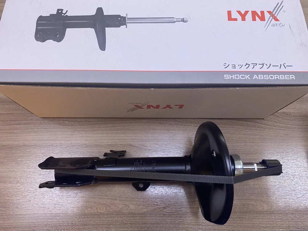 Амортизатор передний левый газомасляный (производитель Япония) Chery Tiggo Chery Tiggo 3 Lifan X60 X70 Чери Тигго Чери Тигго 3 Лифан Икс60 Икс70