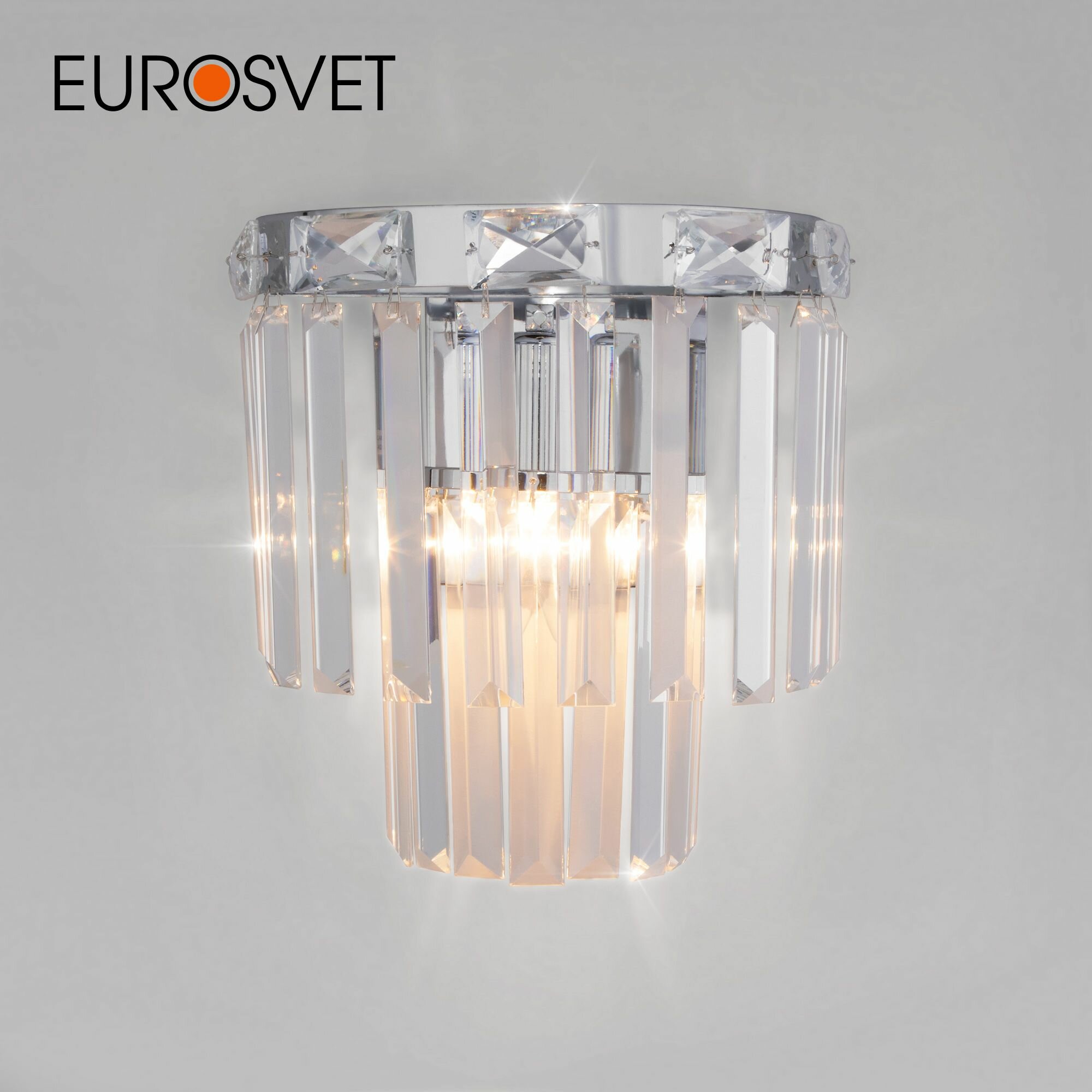 Бра / Настенный светильник Eurosvet Elegante 10130/1, E14, 60 Вт, цвет хром/прозрачный хрусталь Strotskis