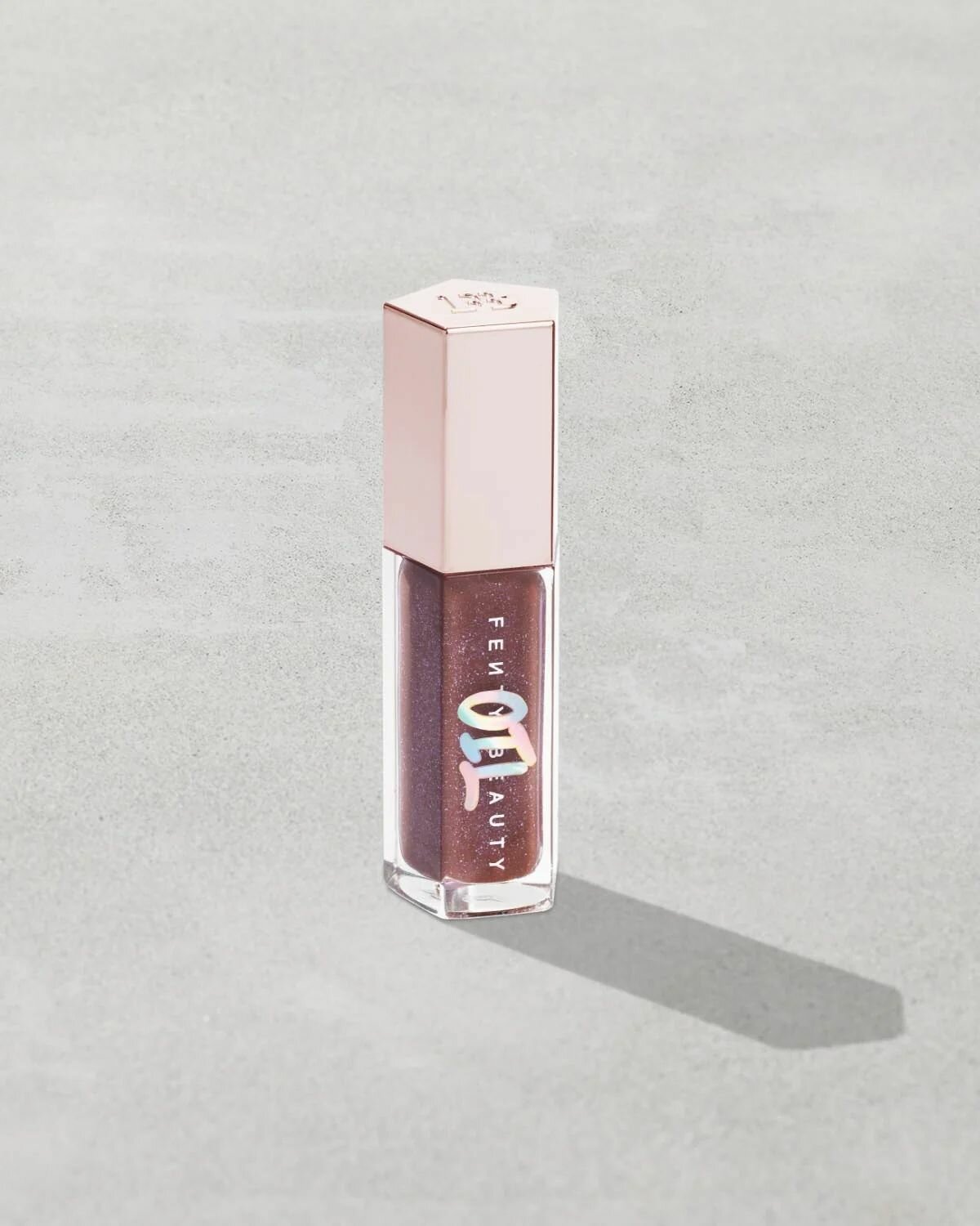 Fenty Beauty Мерцающее блеск масло для губ Gloss Bomb Oil Luminizing Lip Oil N' Gloss, Rose Amber, 9 мл