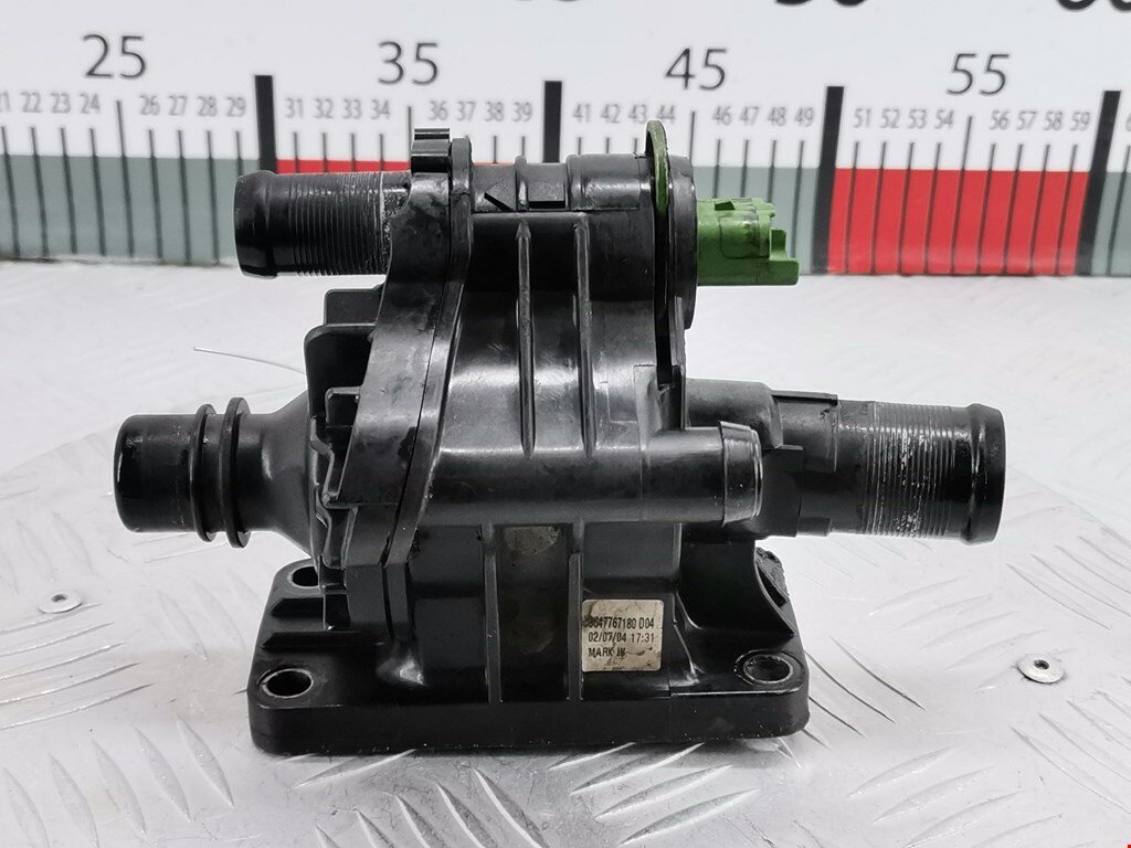 Корпус термостата Peugeot 307 1336X2 арт. 1609532