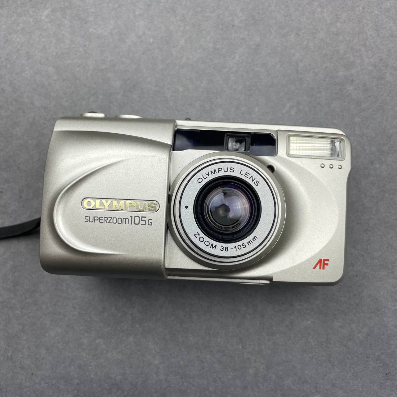 Винтажный пленочный фотоаппарат Olympus Superzoom 105G