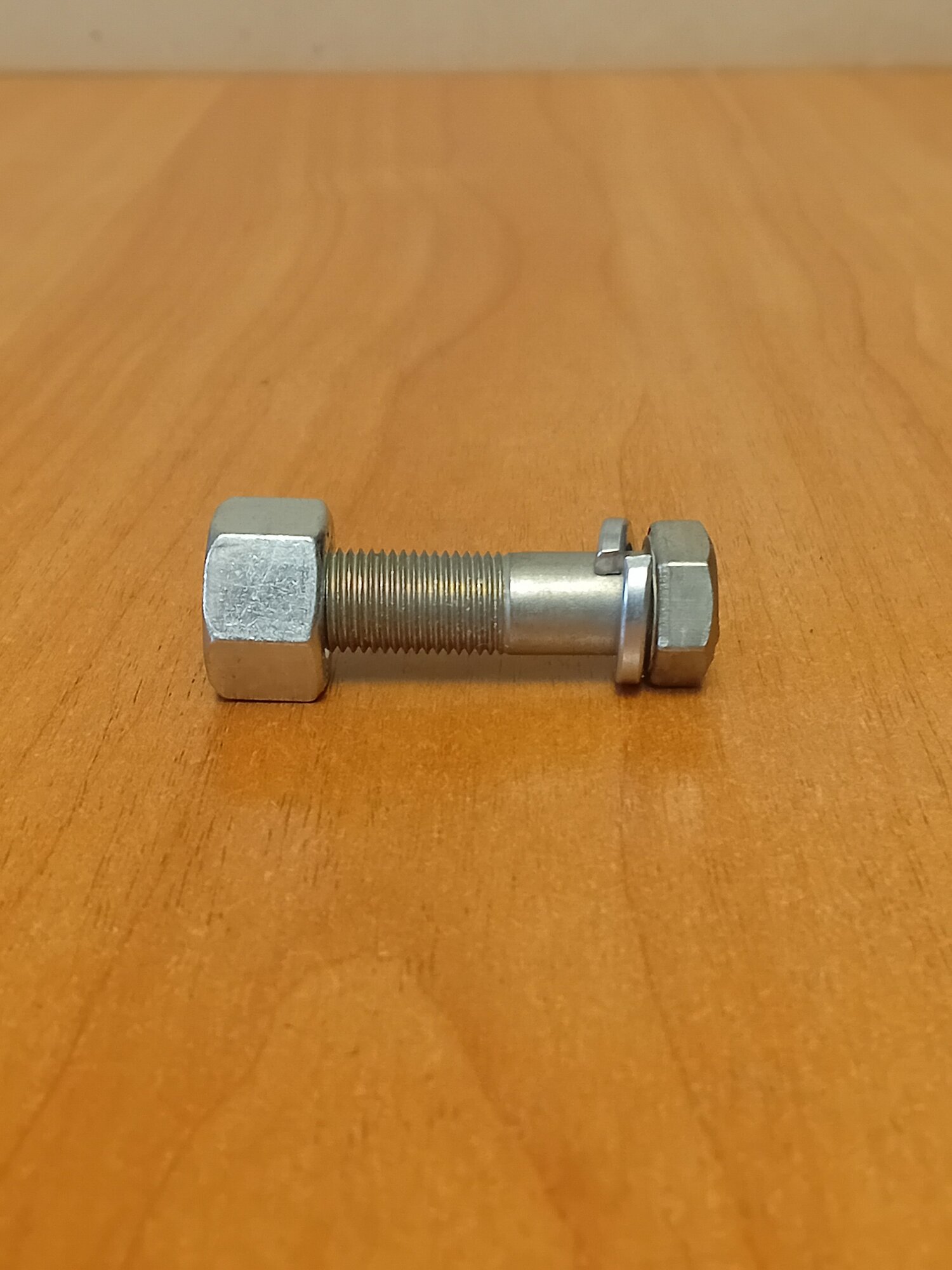 Болт М10х1х40 в сборе с гайкой и гровером для автомобилей (кардана МАЗ и др.). Класс прочности 10.9. БелЗАН