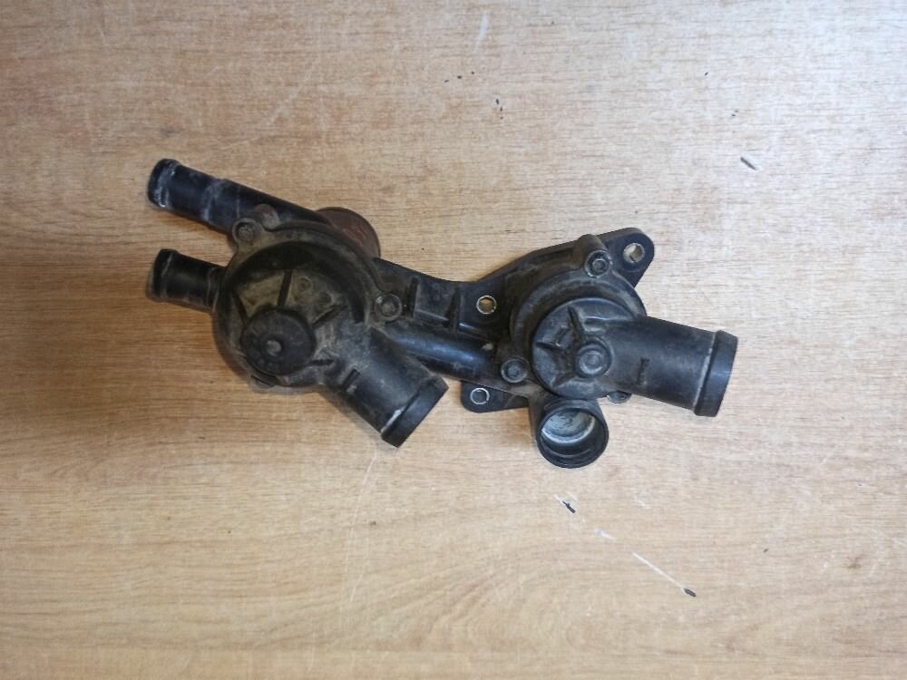 Корпус термостата охлаждения 1.6 BLF VW Passat B6