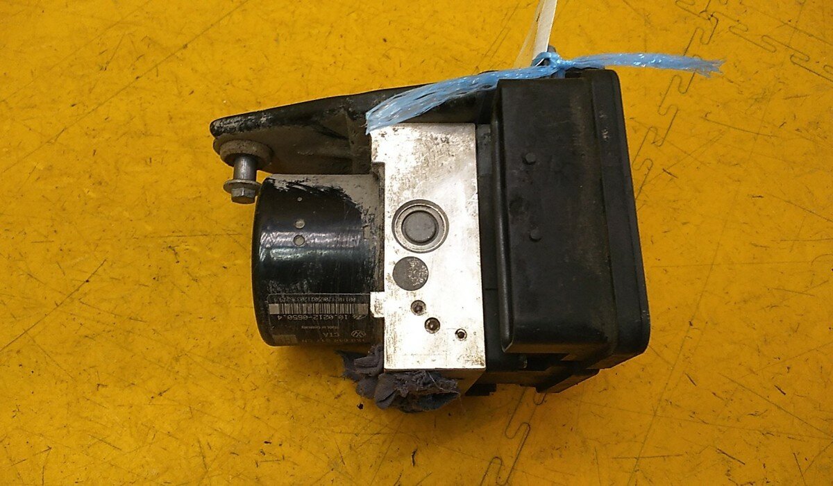 Блок ABS (насос) Caddy III Volkswagen 1K0614517CN
