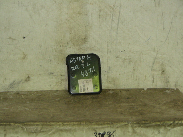 Б/У Кронштейн панели задка левый, Opel (Опель)-Астра OPEL ASTRA H (04-) Новый 49711 GENERAL MOTORS арт. 5184266