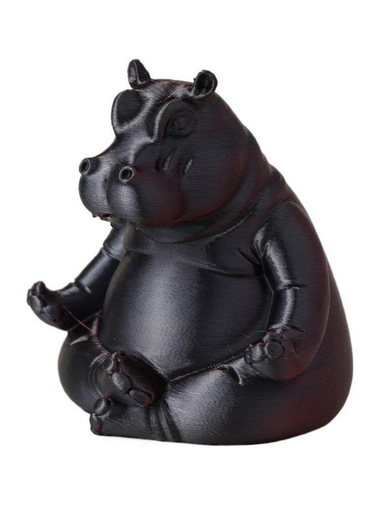 Симпатичная декоративная статуэтка бегемота