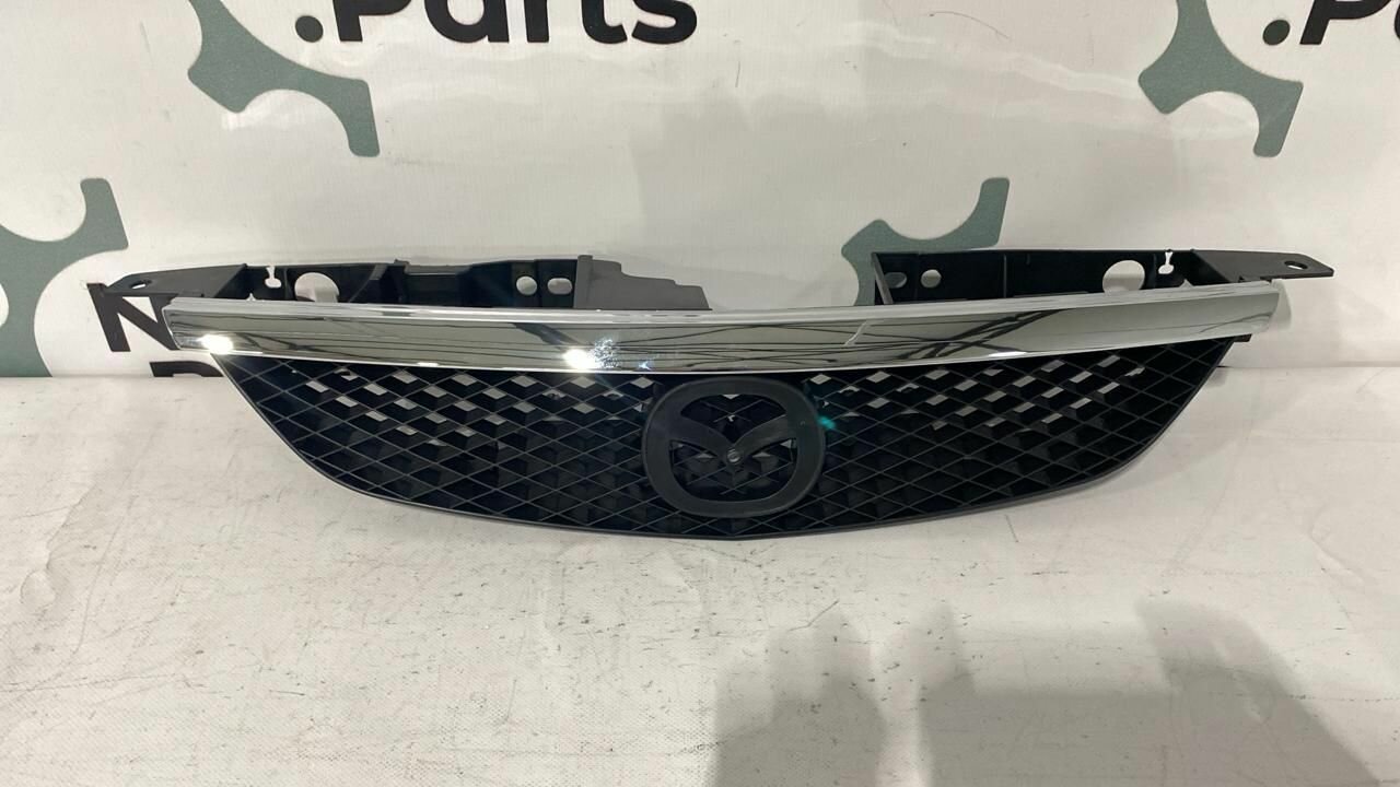 Решетка радиатора Mazda 323 BJ 01-03